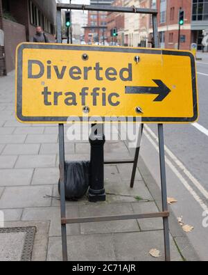 Diverted traffic road signs on the pavement, London Stock Photo - Alamy