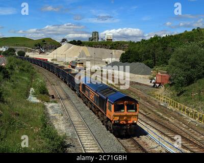 Freight trains at Peak Forest, Derbyshire with a GB Railfright class 66 ...
