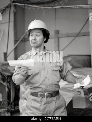 Happy factory workers indoors old factory shop Stock Photo - Alamy