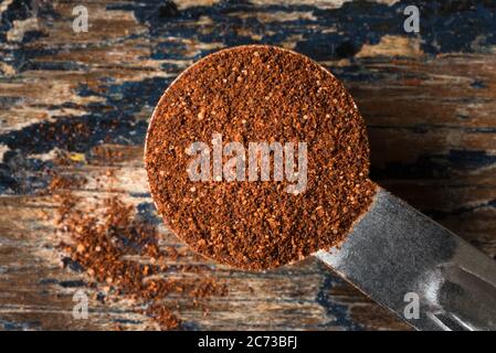 Chili Powder Spilled from a teaspoon Stock Photo - Alamy