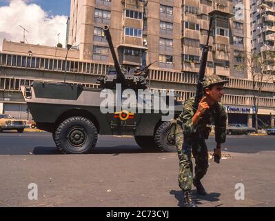 CARACAS, VENEZUELA, MARCH1989 - Soldiers in armored vehicles on street ...