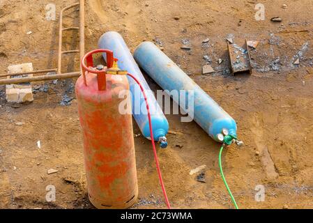 Stack of propane tanks on the dock Stock Photo - Alamy