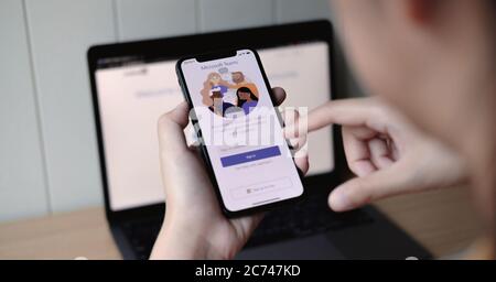 CHIANG MAI, THAILAND - JUN 22, 2020 : female touching iPhone with ...