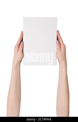 White rectangular box in female hands. Top view. Isolate Stock Photo ...