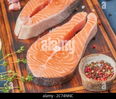 Side view of sliced salmon fish displayed in wet market Stock Photo - Alamy