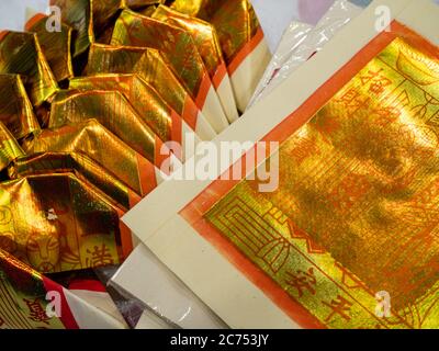 Gold Chinese joss paper aka ghost money, spirit money or hell bank ...