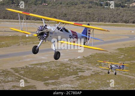 An air to air portrait of two restored 1940's US Navy Boeing Stearman ...