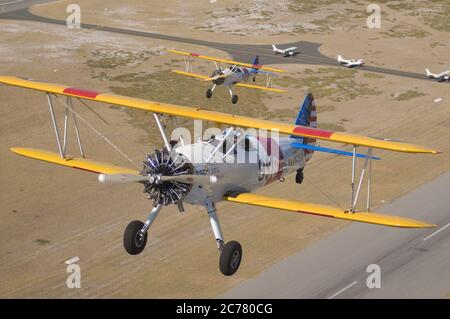 An air to air portrait of two restored 1940's US Navy Boeing Stearman ...