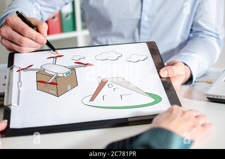 Businessman showing drone delivery concept on a clipboard Stock Photo ...
