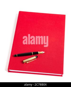 Pen and pencil with nib on book with old handwriting Stock Photo - Alamy