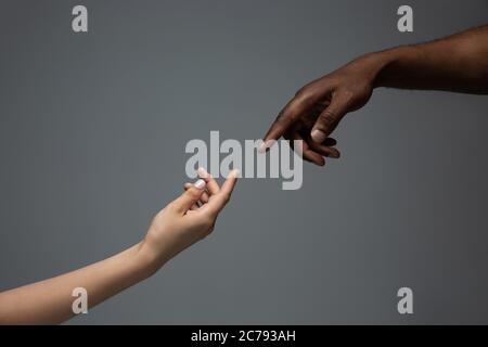 Touch of God. Racial tolerance. Respect social unity. African and ...
