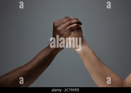 Helping hands. Racial tolerance. Respect social unity. African and ...