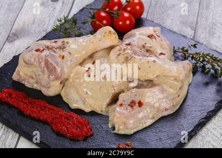 Marinated chicken parts ready for roast Stock Photo - Alamy