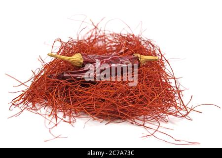 Chili threads isolated against a white background Stock Photo - Alamy