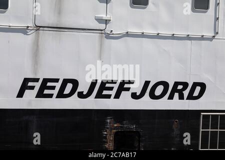 Ro-ro car and passenger ferry Fedjefjord (built 2001) at a layby berth ...