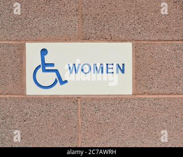 Womens Public Restroom is Handicap Accessible Sign Stock Photo - Alamy