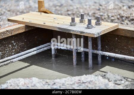 Construction of foundation. Steel bolt in concrete. Fasteners for frame ...