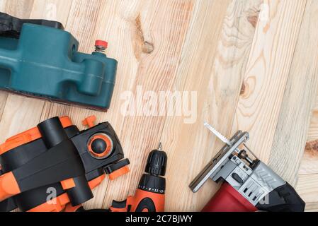 Set of handheld woodworking power tools for woodworking and workpiece ...