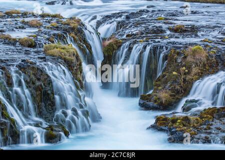 The blue Bruarfoss waterfall, Brekkuskógur, Iceland Stock Photo - Alamy