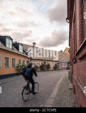 Old houses along cobblestoned streets in medieval old town of Lund ...