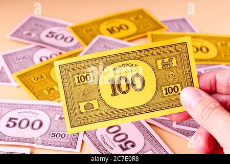 Holding a monopoly 500 note Stock Photo - Alamy
