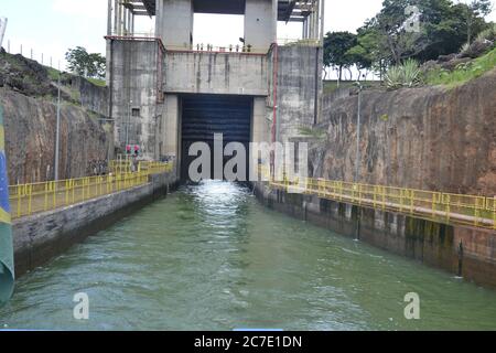 Dam, with an internal view in a freshwater river, iron and concrete ...