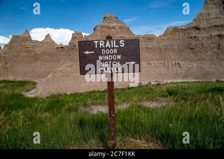 The sign for the Door, Window, and Notch Trails in Badlands National ...
