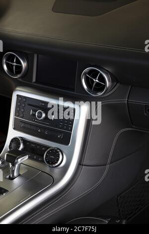A vertical shot of a modern black car covered in rain Stock Photo - Alamy