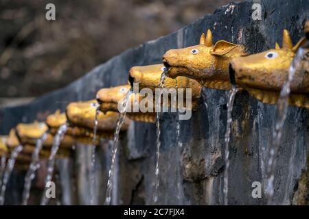 Mukti Dhara, 108 waterspouts pouring sacred water, at Muktinath Temple ...
