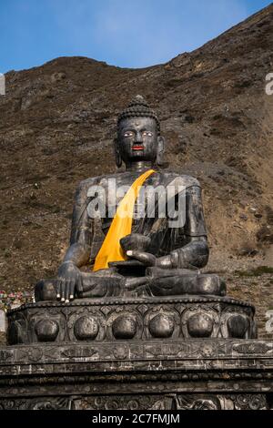 Statue of Buddha at Muktinath Temple, Lower Mustang, Nepal Stock Photo ...