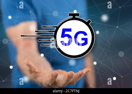 5g concept above the hand of a man in background Stock Photo - Alamy