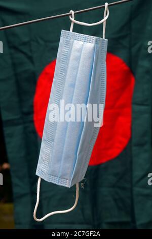surgical mask with the national flag of Bangladesh printed. Pandemic ...