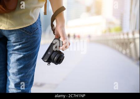 hand holding digital camera, traveling concept Stock Photo - Alamy