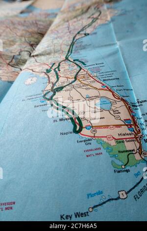 Folding United States Travel Map with Routes Marked Stock Photo - Alamy