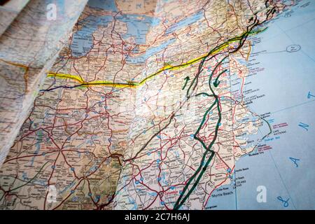 Folding United States Travel Map with Routes Marked Stock Photo - Alamy