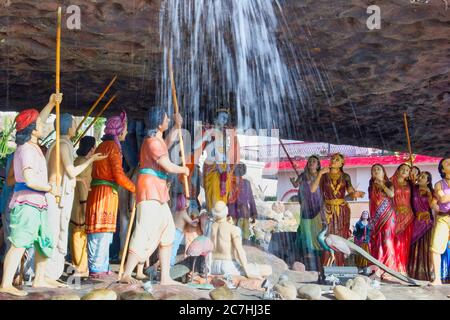 Krishna holding a mountain Stock Photo - Alamy