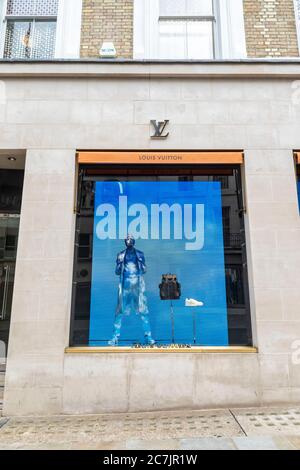 A window with the logo of Louis Vuitton above at their store in the ...