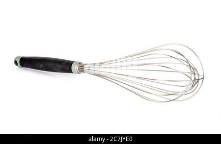 steel whisk in front of white background Stock Photo - Alamy