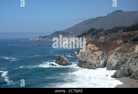 water flowing from the rocks into the ocean on the coastline Stock ...