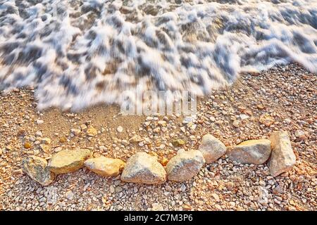 Weaves on seashore on beautiful beach of Gradac in Makarska riviera ...