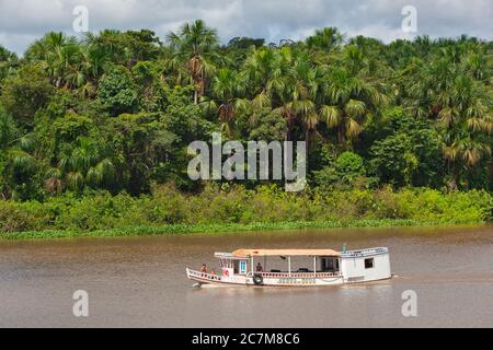 A typical traditional small Brazilian ferry boat on the River Amazon ...