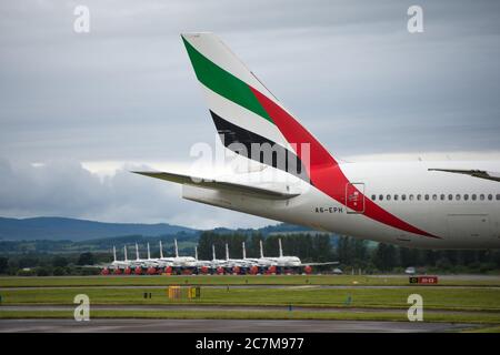 Tail fin of an Emirates aircraft showing logo Stock Photo - Alamy