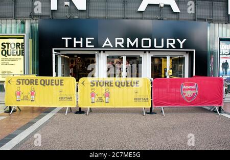A sign 'Keep 2 metres from customers and staff' seen at the entrance to ...