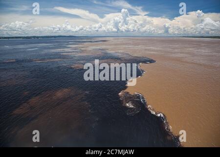 Confluence of the Rio Negro and the Amazon, Manaus, Amazonas state ...