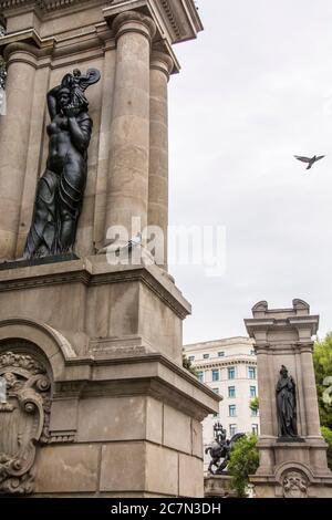 Statues, buildings and fauna dot the landscape of the Cataluna Plaza in ...