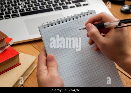 Male black notepad ballpoint pen and calculator, small alarm clock and ...