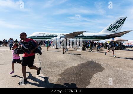 Crowd of spectators running to claim their viewing spot at the Rhode ...