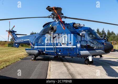 German Federal Police (Bundespolizei) Eurocopter AS332 Super Puma helicopter in flight. Germany ...