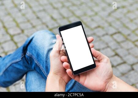 close up. businessman uses a smartphone sitting at his Desk Stock Photo ...