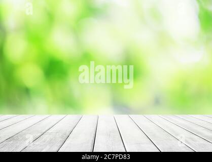 Plank Wood table top with blur nightclub bar counter with bokeh light ...